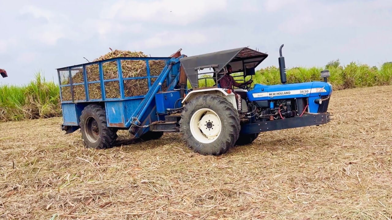 New holland infielder tractor working with loaded trolley | tractor ...