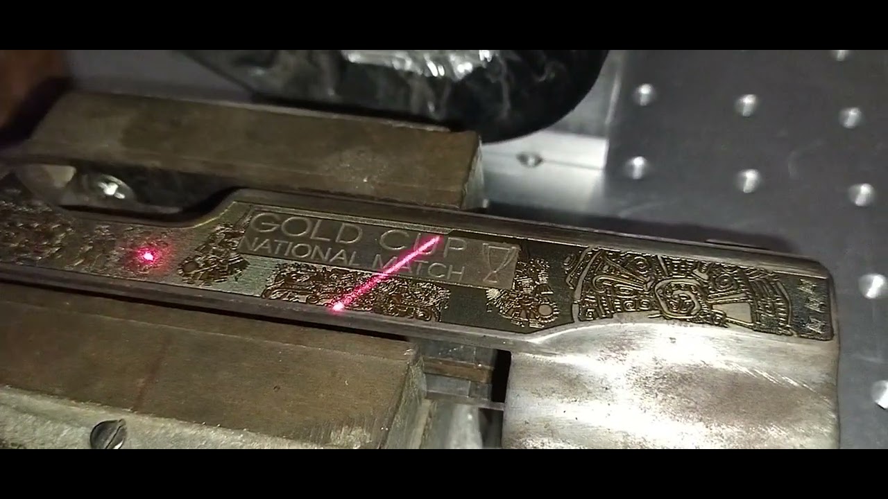 grabado laser pistola colt 45 laser engraving colt 45 - YouTube