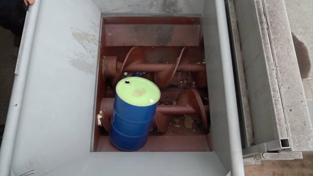 Komar Dual Auger Crushing Metal Drums - YouTube