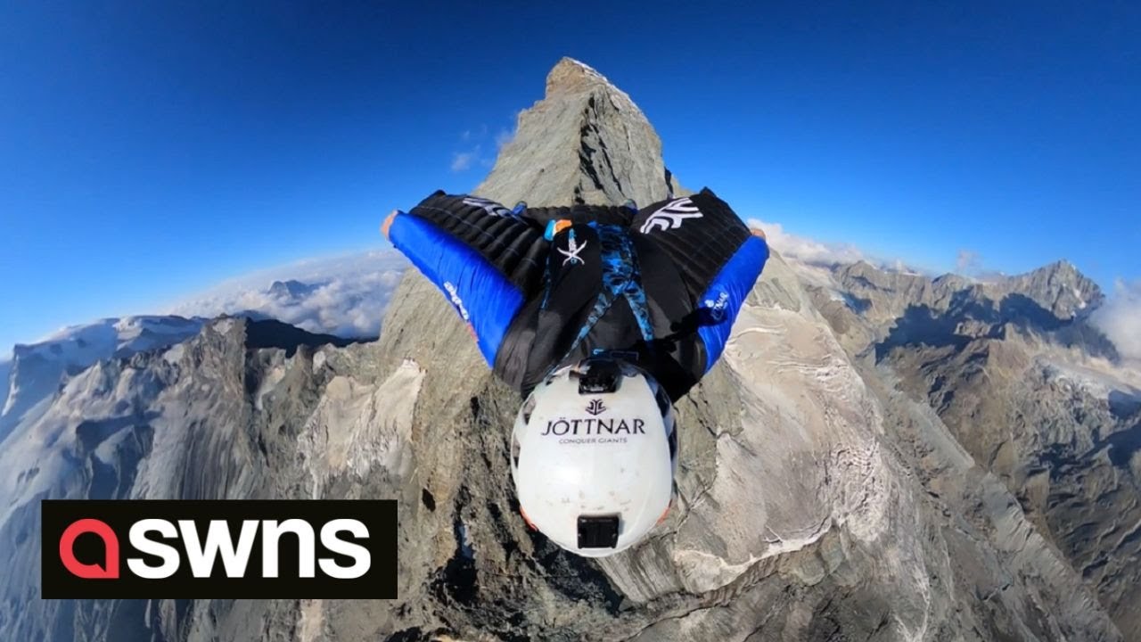360-degree headcam captures stunning wingsuit jump over Swiss Alps ...