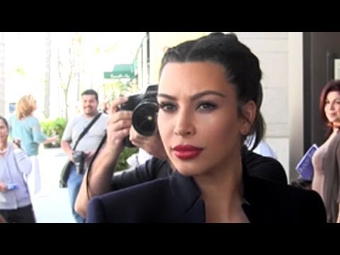Pregnant Kim Kardashian Basks In The Non-Stop Media Attention