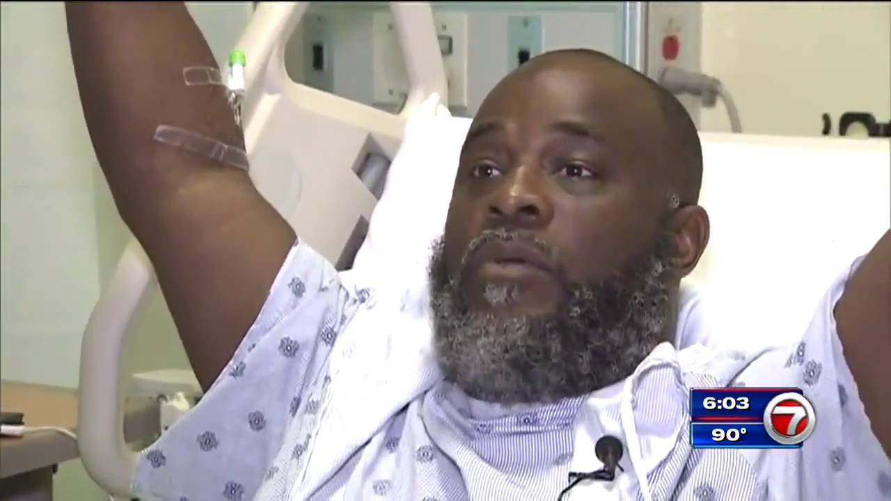 UNARMED BLACK MAN WITH HANDS UP LAYING IN STREET SHOT BY POLICE ...