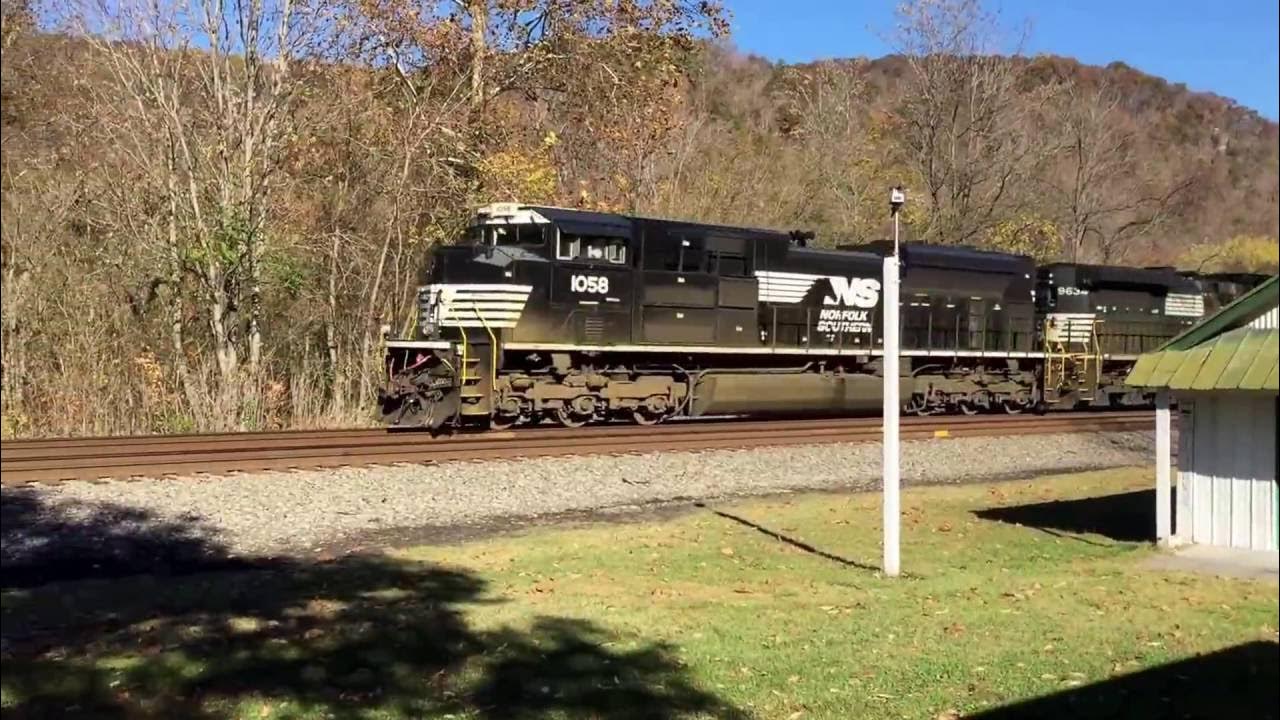 SD70ACe Leads NS 23Q Bare Tables Train - YouTube