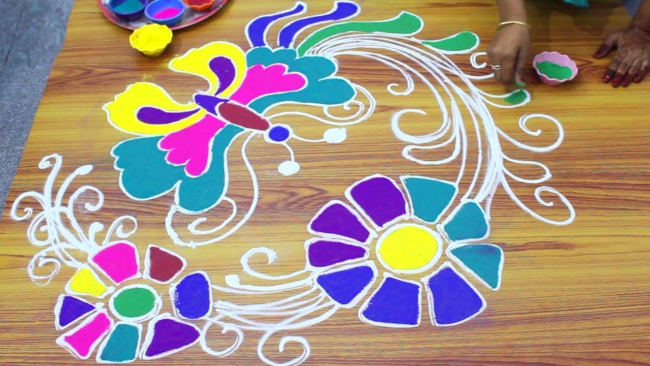 Colorfull Butterfly Rangoli Design | Unique Butterfly Rangoli Designs ...