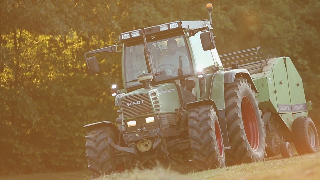 Fendt Favorit 510C Turboshift baling with DEUTZ-FAHR round baler - YouTube