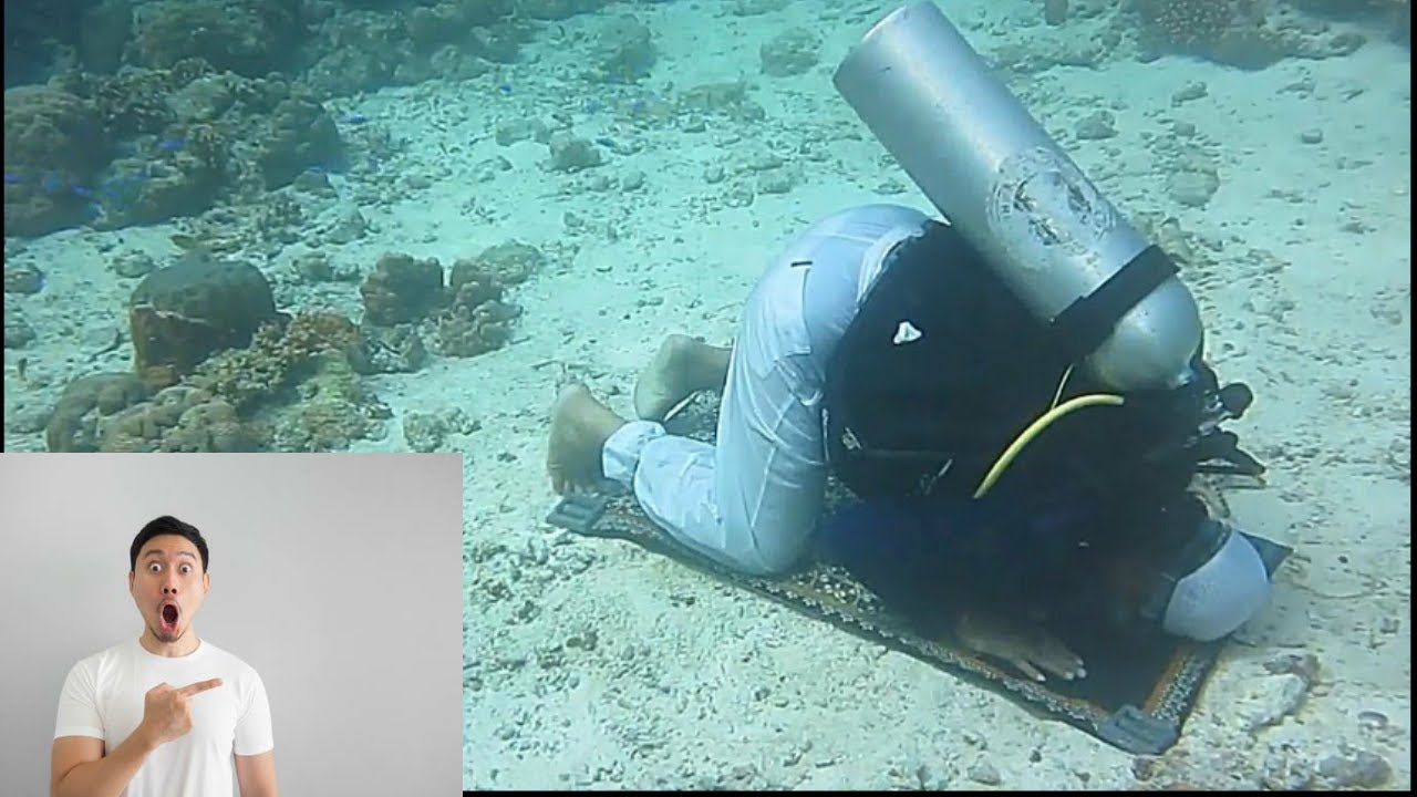 The view of a Muslim praying under the water. Really surprising ...
