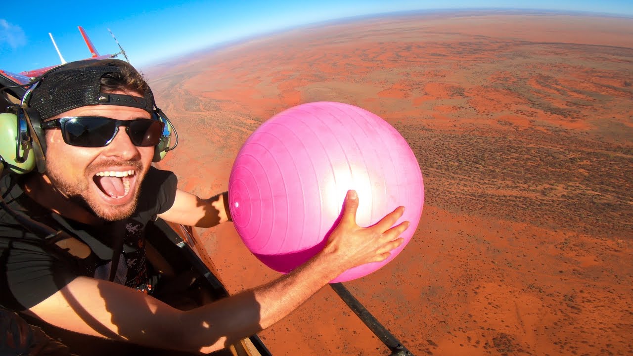 We Threw An Exercise Ball From A Helicopter at 2000ft - YouTube