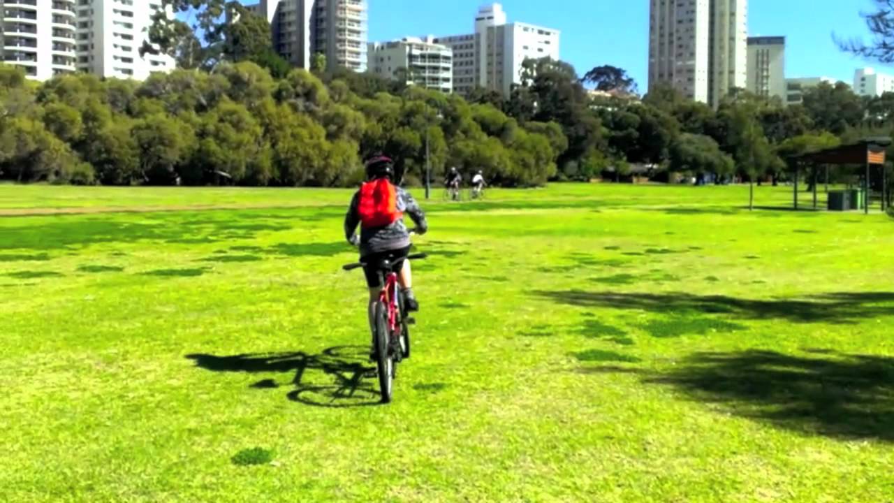 solo riding a tandem bike on grass - YouTube