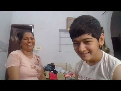 MOM SON EATING APPLE  ON WEBCAM