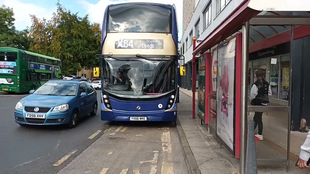 E400 MMC leeds bus 33482 driving out of headingley armdale centre to ...
