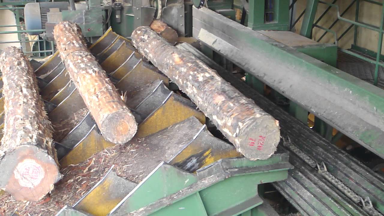 Cooper Machine Stop and Loader for Precision Sharp Chain Scragg - YouTube