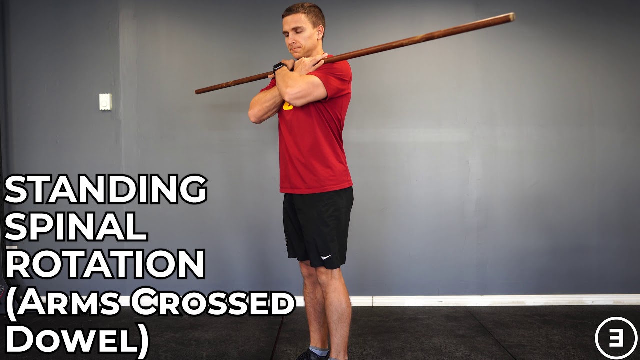 Standing Spinal Rotation (Arms Crossed Dowel) - YouTube