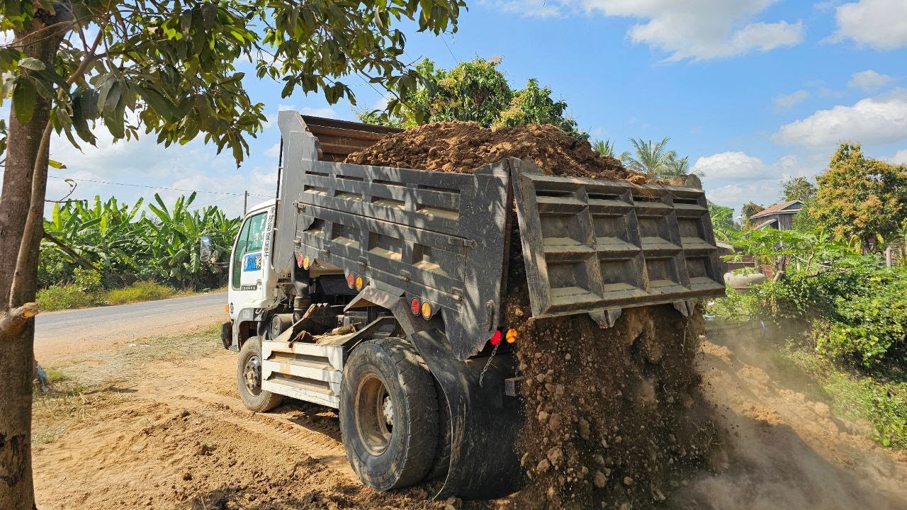 Amazing Earthmoving Trucks and Tractors Are at Work - YouTube