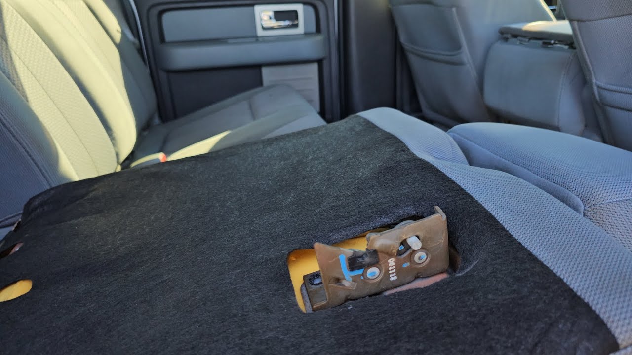 How to fold down rear seats on Ford F150 2009-2014 - YouTube