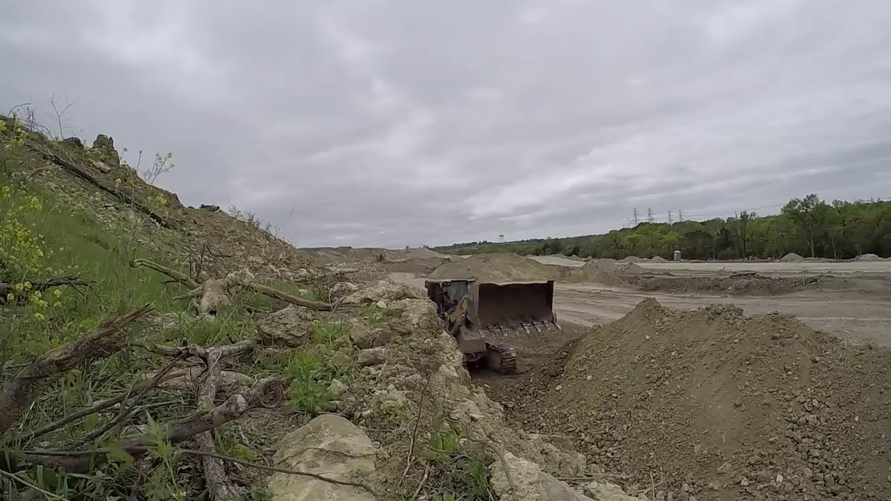 963D track loader loading fill dirt - YouTube