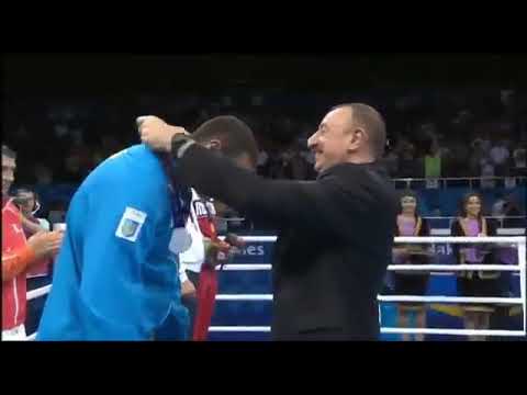 President Ilham Aliyev presenting a medal to Armenian sportsman