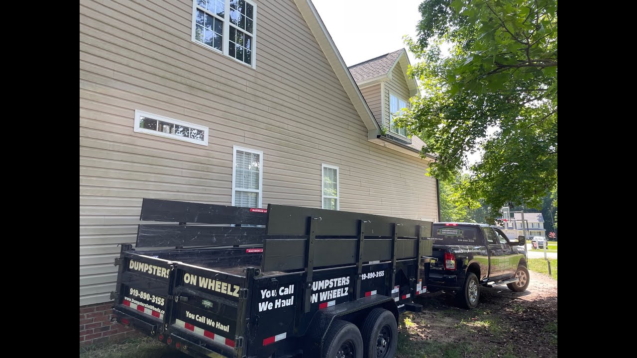 Throw Junk out 2nd story window to Dumpster - YouTube