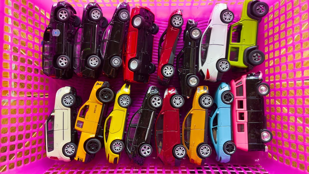 Collection of Toy Cars SUV, Sedan, Super Sports Cars In Pink Basket ...