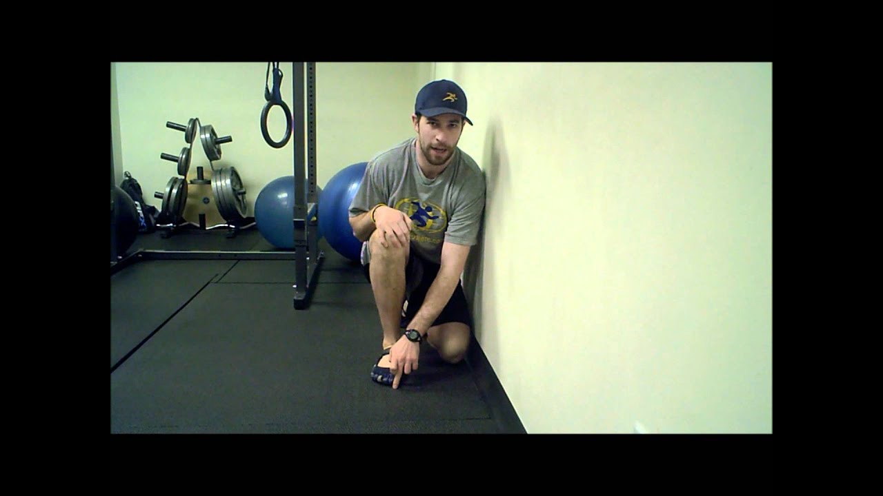 Exercise of the Week: Wall Knee Touch - YouTube