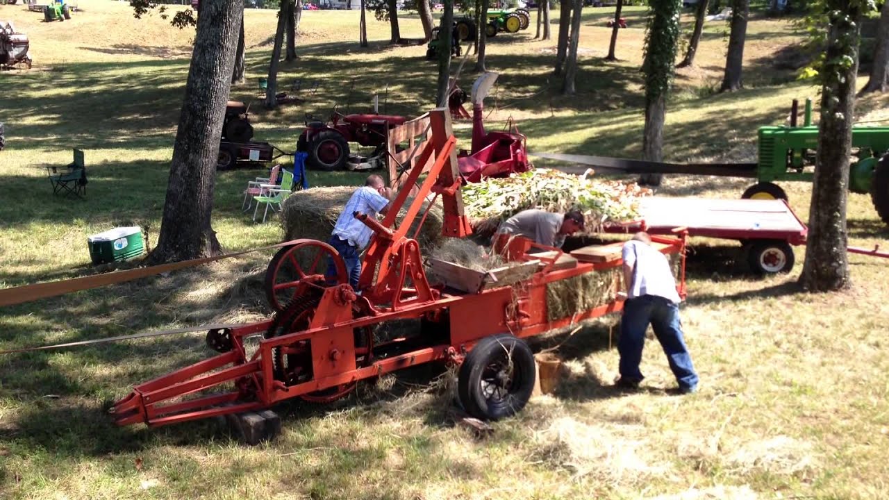 Antique manual hay baler - YouTube