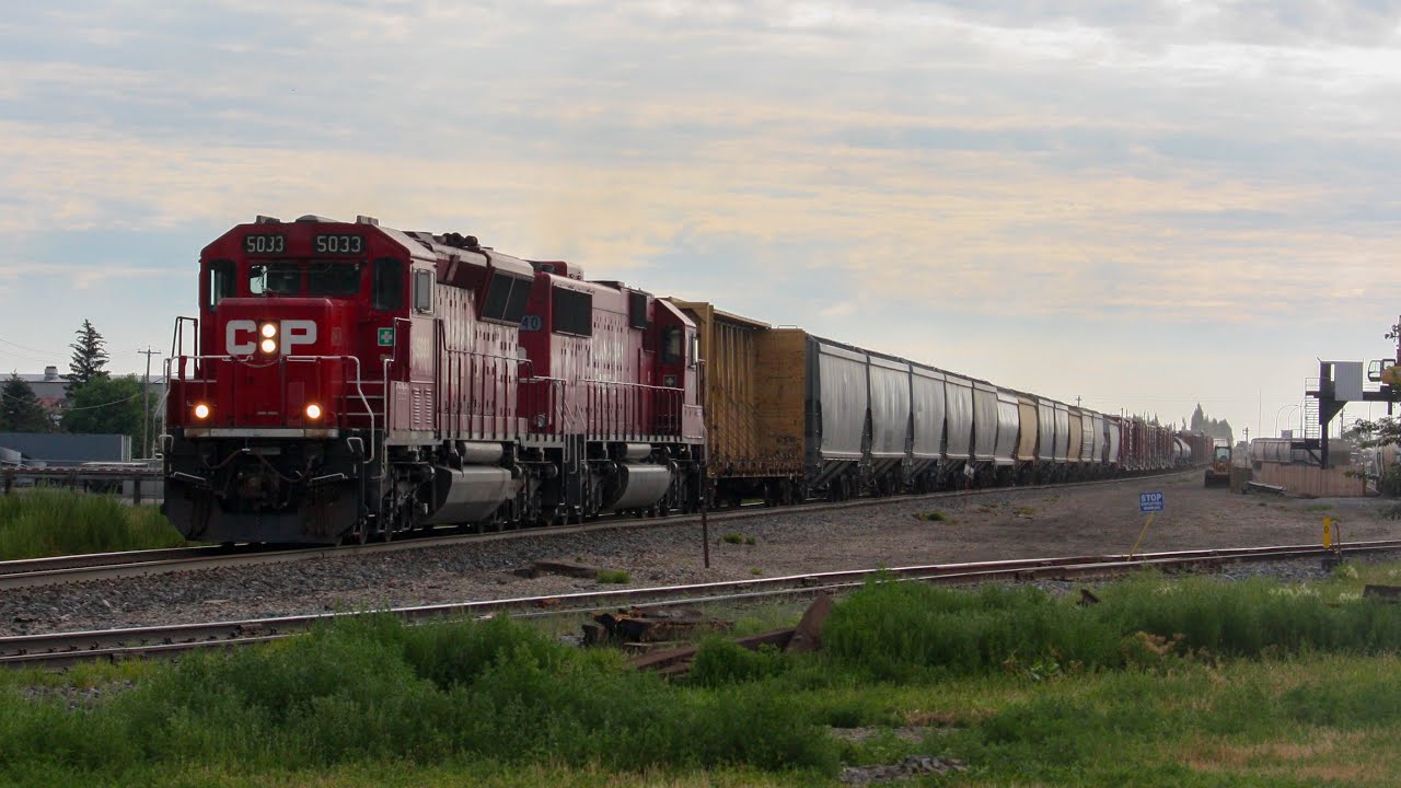 SD30C-ECO w/SD60!!!! CP 5033 and CP 6240 lead CP C27 west at Coaldale, Alberta - YouTube