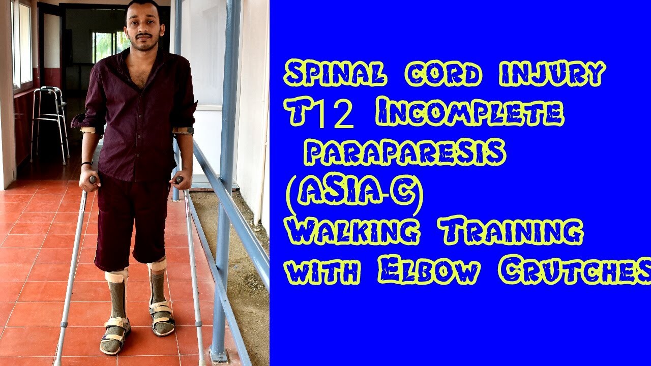 spinal cord injury T12 para paresis elbow crutch walking - YouTube