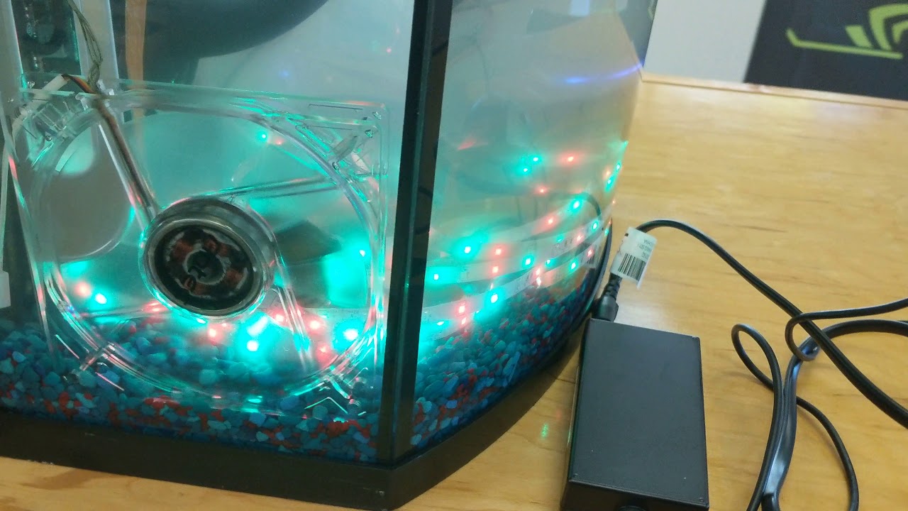 PC fan spinning in mineral oil... - YouTube