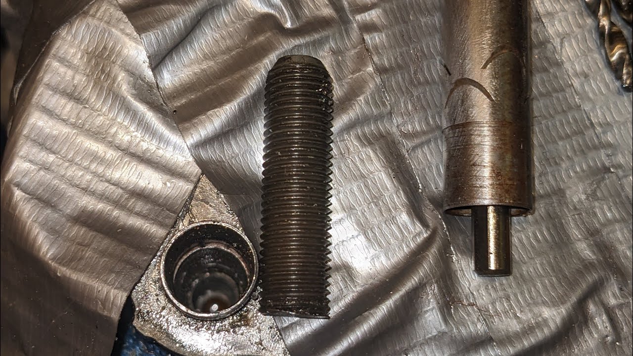 How to extract a broken bolt from deep inside an engine block - YouTube