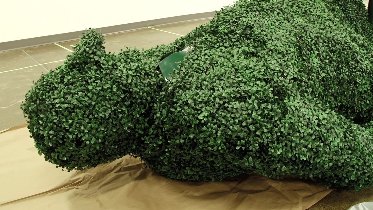 Topiary Man in downtown Columbus made at the Point - YouTube