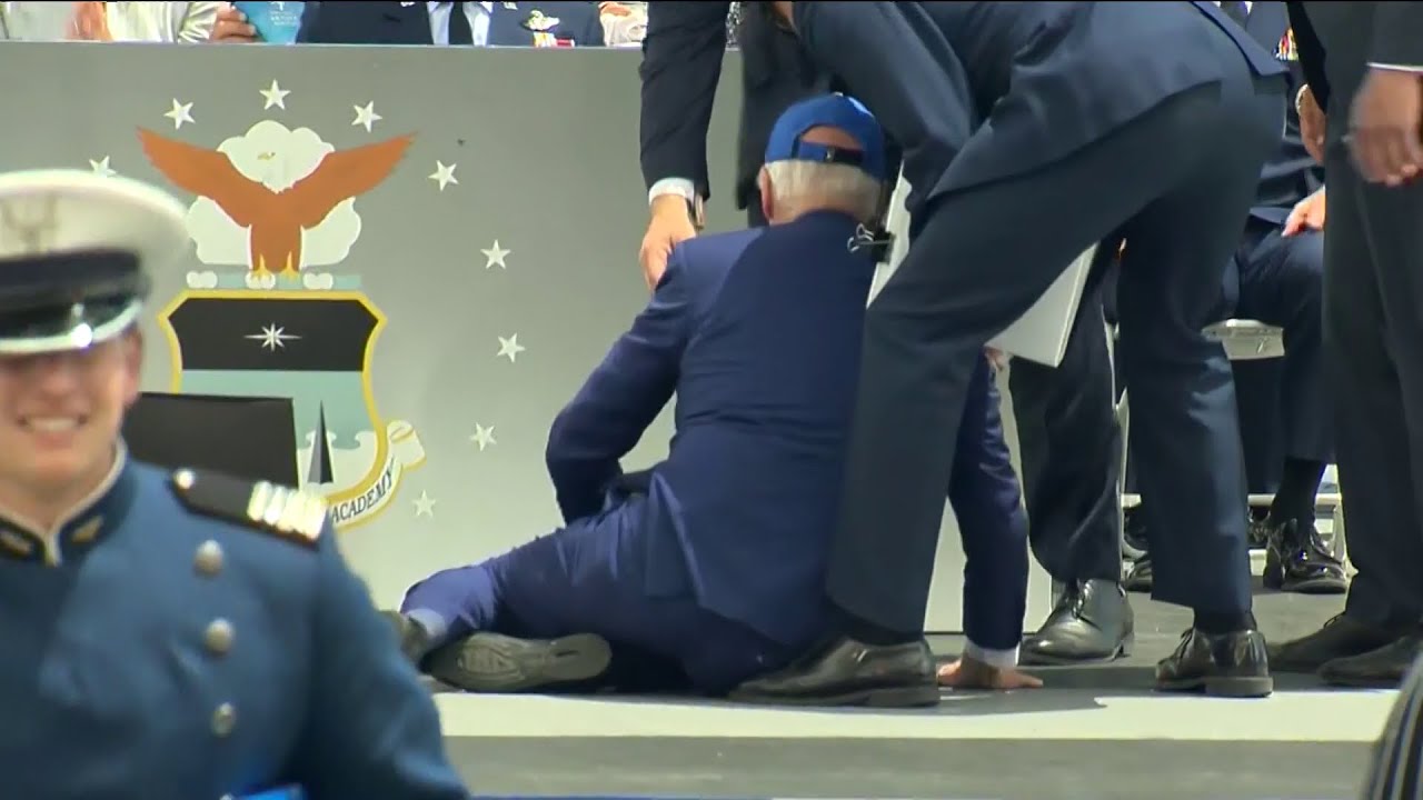 President Biden trips, falls at US Air Force Academy graduation - YouTube