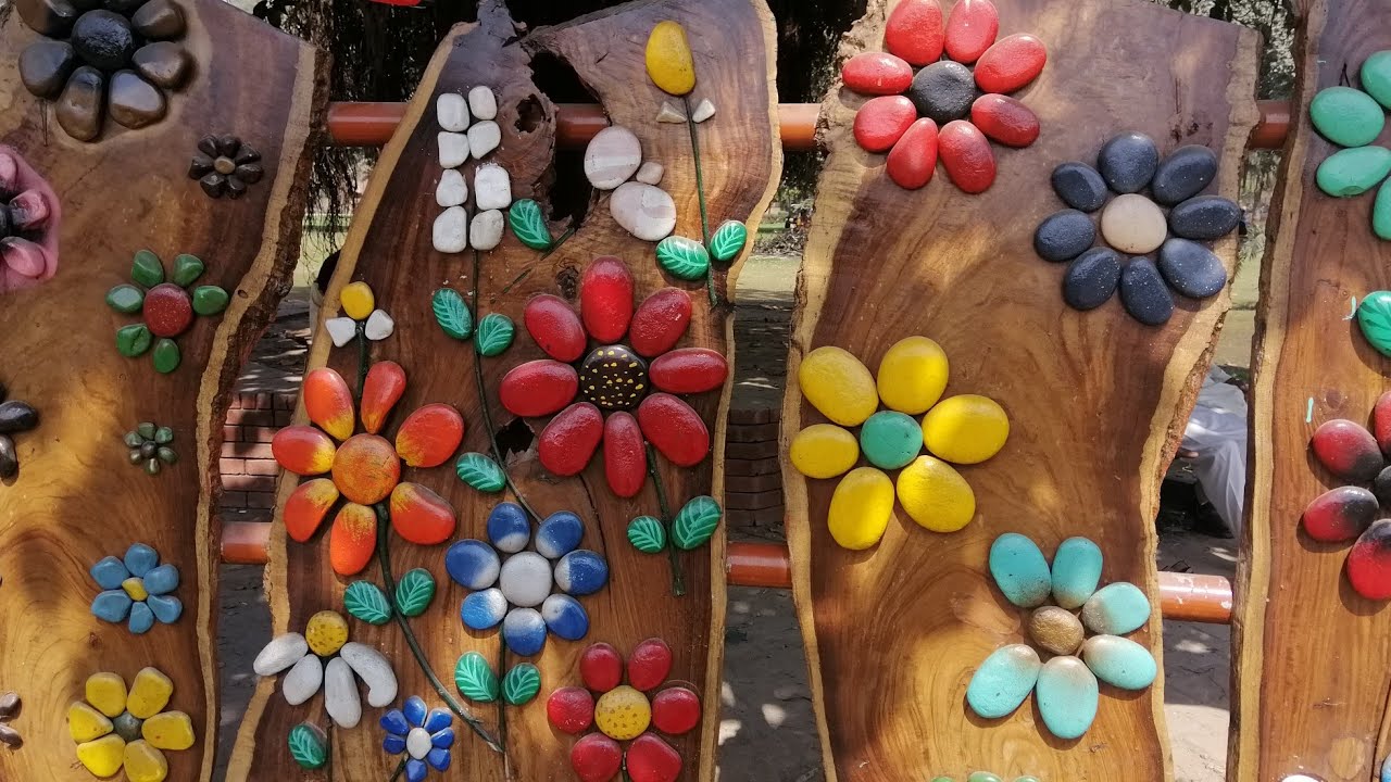 Beautiful art work with river stone | stone garden ideas | river stone ...