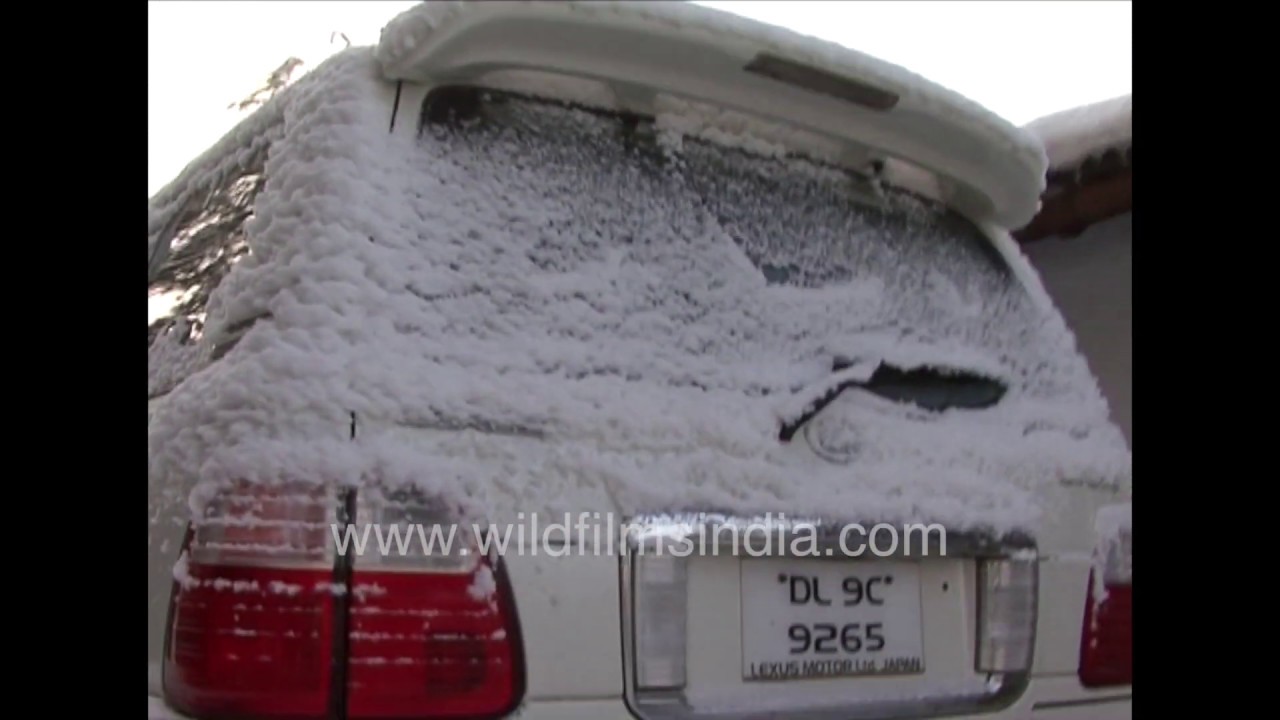 Winter morning in Landour and the Land Cruiser is encrusted with ice ...