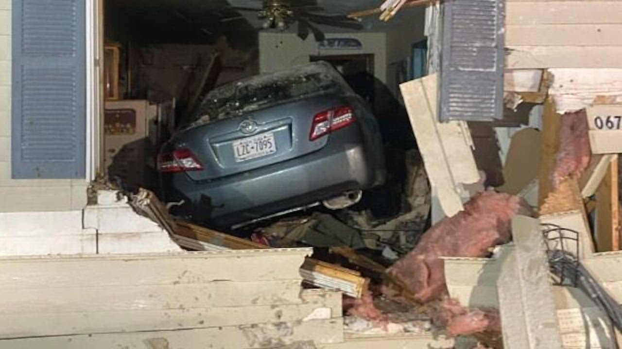 Man describes being pinned under car after vehicle crashes into home ...
