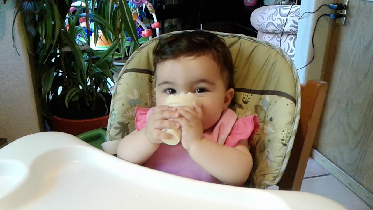 9-month-old baby Adelina is eating an ice cream cone - YouTube