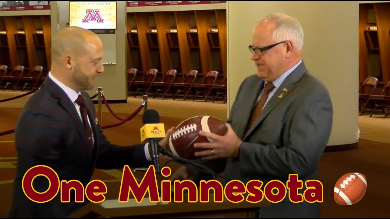 Governor Walz accepts Gopher Football game ball on behalf of the State ...
