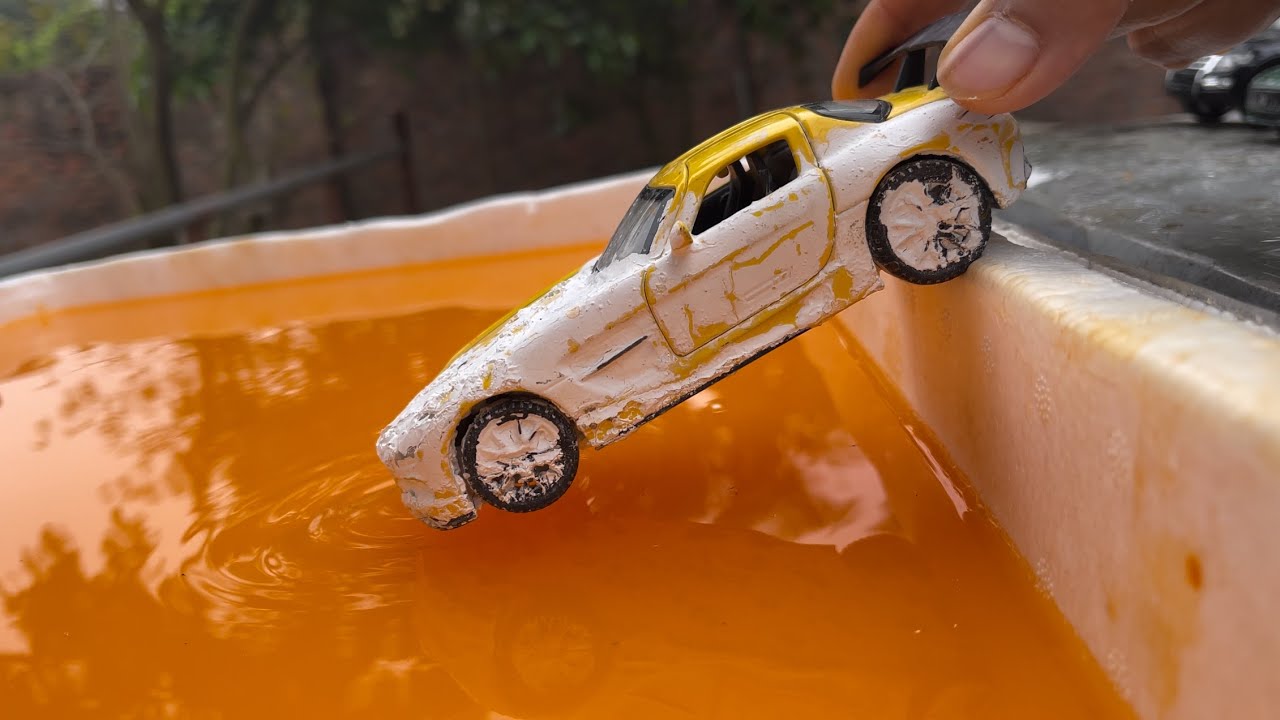 Car Falling Into Orange Water 4K - YouTube