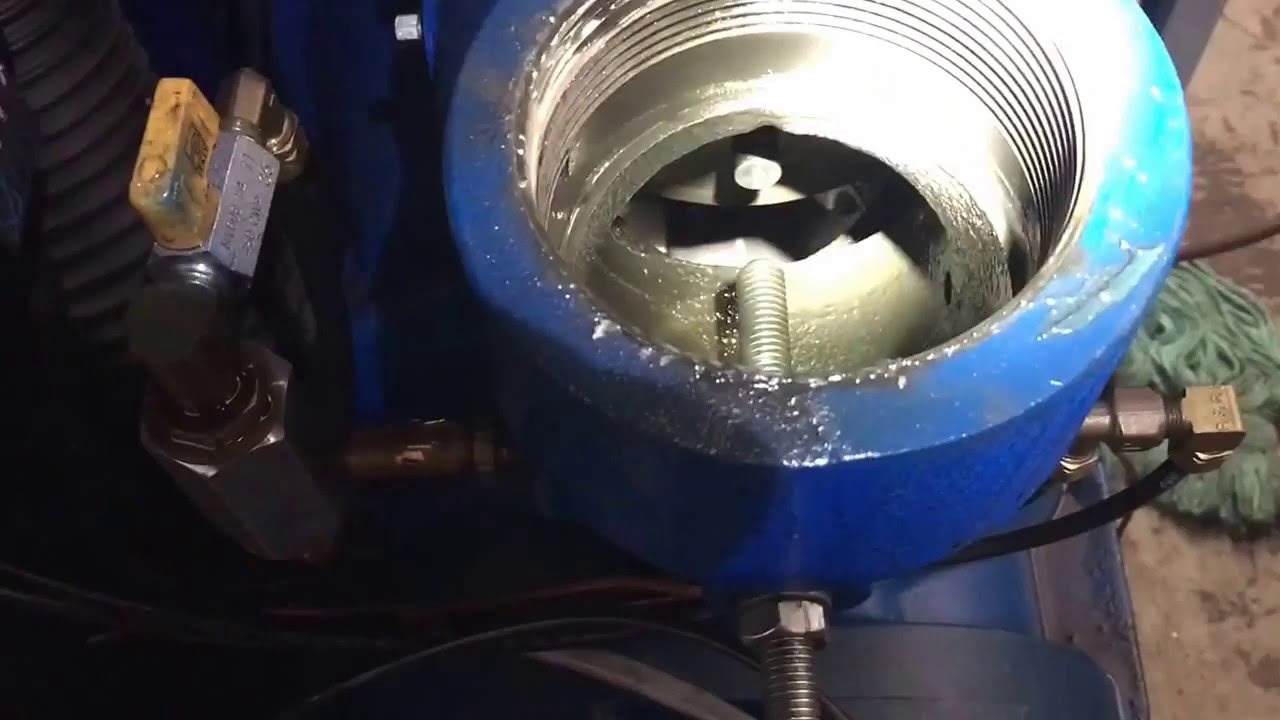 View of rotors inside a running air compressor. - YouTube