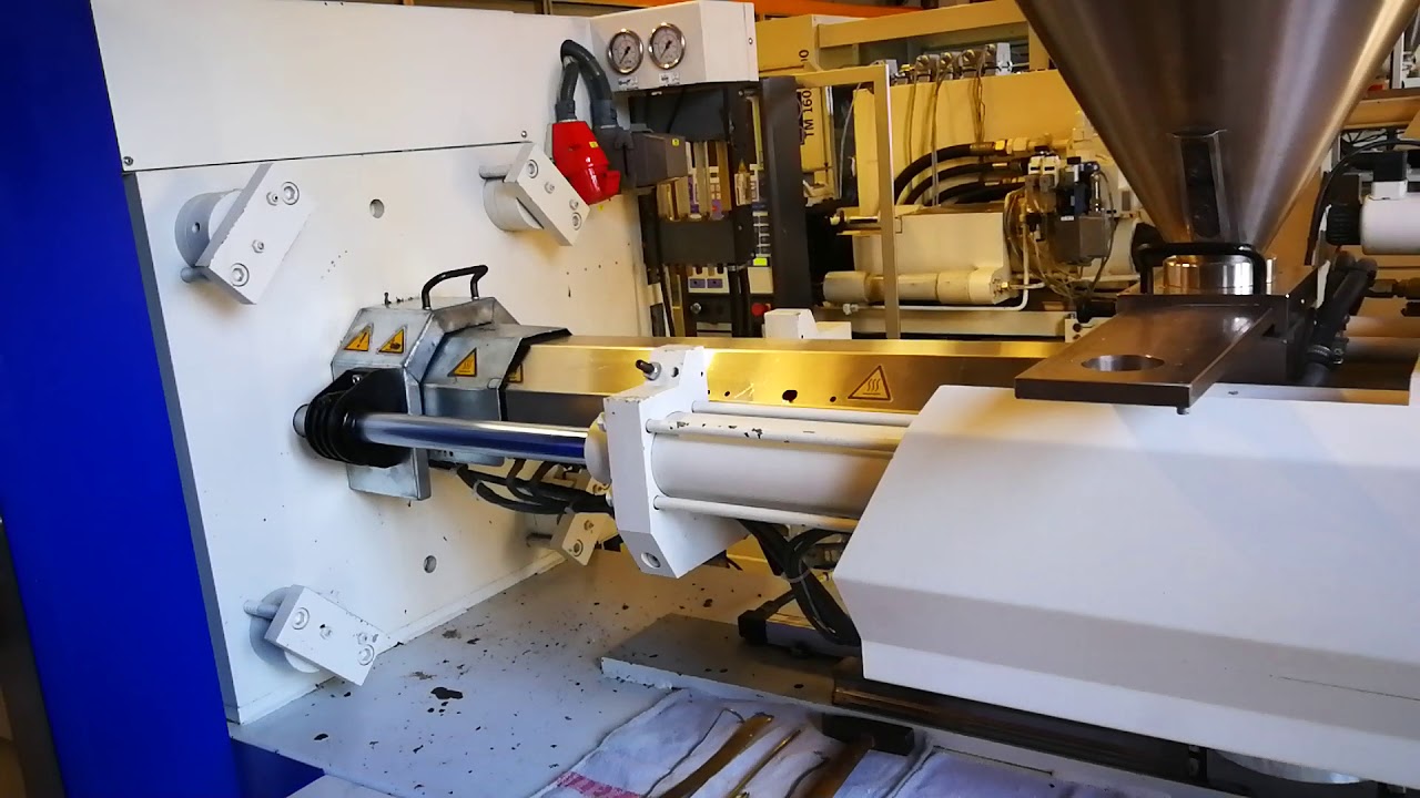 Battenfeld TM 100 525 plastic injection moulding machine for sale - YouTube