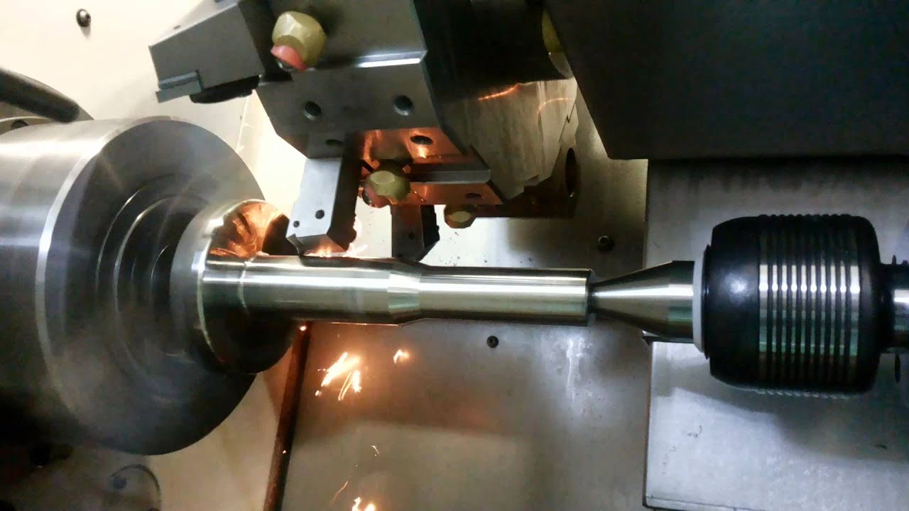 CNC LATHE HARD TURNING SPARK DEF. - YouTube