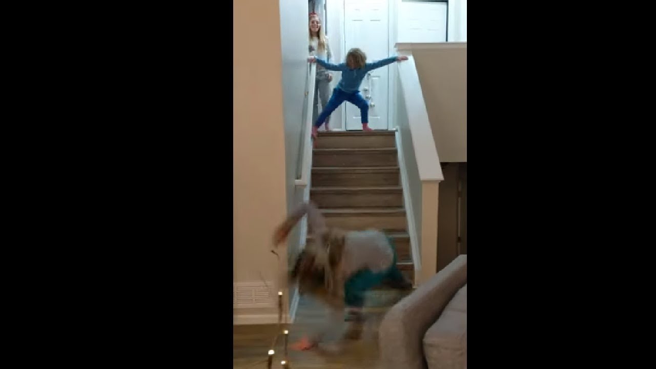 Girl Fell Hilariously While Sliding Backwards Down The Stairs - YouTube
