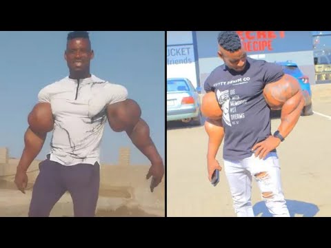 Man with incredibly large biceps leaves people absolutely shocked