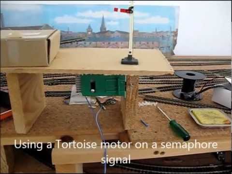 Experimenting with Tortoise motor driving a Semaphore signal - YouTube