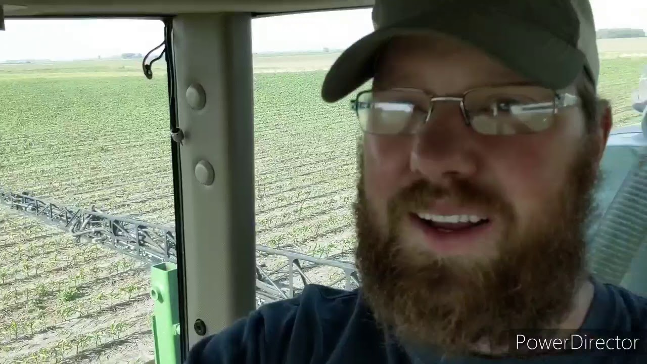 Spraying wide row corn - YouTube