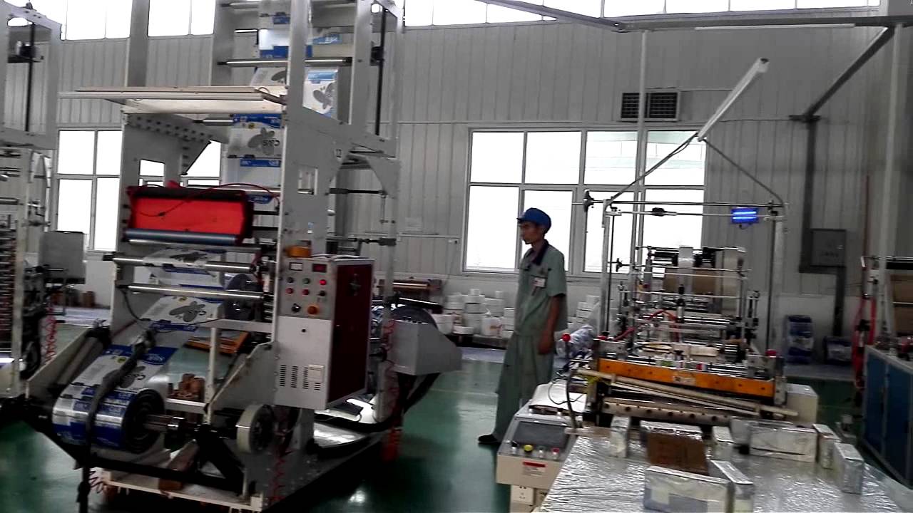 two gusset machine on working toilet paper plastic bag making gusset ...