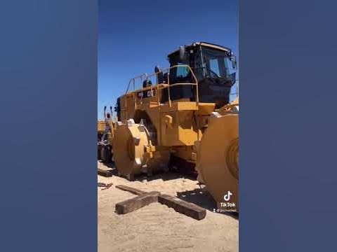 CAT 836K Compacter getting loaded for transport - YouTube