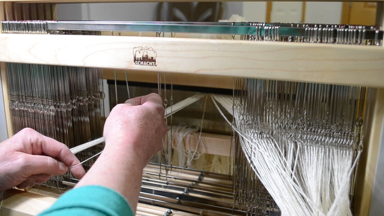 Dressing the loom from front to back & threading the heddles. - YouTube