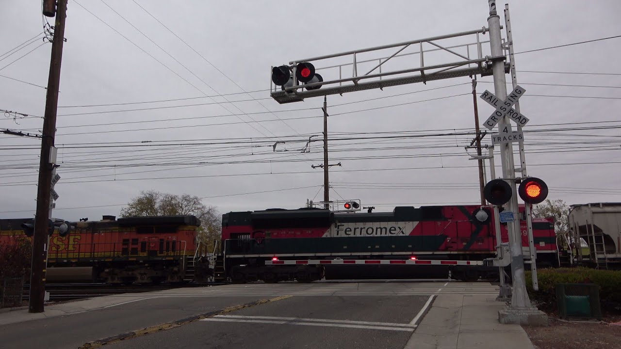 BNSF 6047 With FXE & 7974 Trains Meet & Light Rail Train, 26th Ave ...