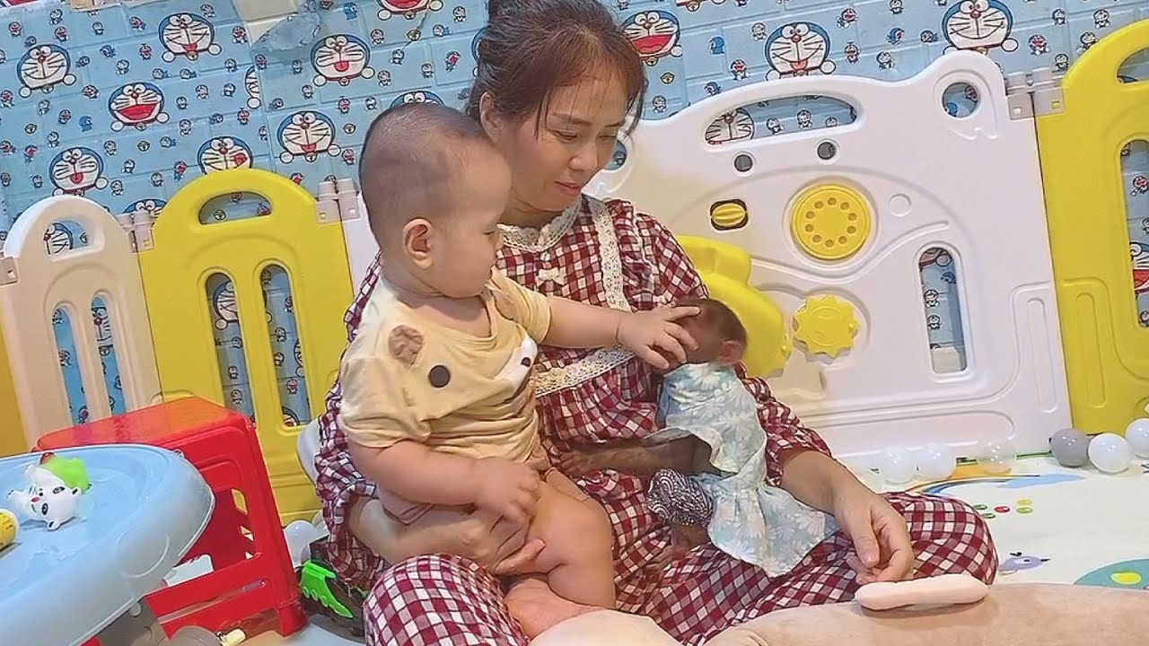 Baby Minh is not happy when Monkey Molly takes over his Mom - YouTube