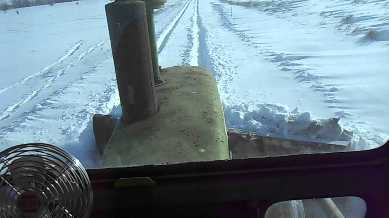 Pushing Snow with the 4020 and Waldon Dozer. - YouTube