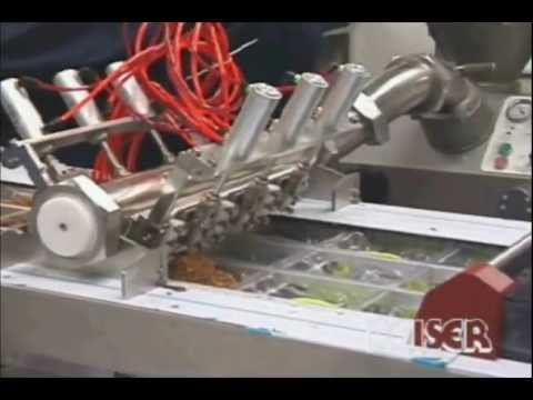 Vemag 500 depositing into Repak packaging - YouTube